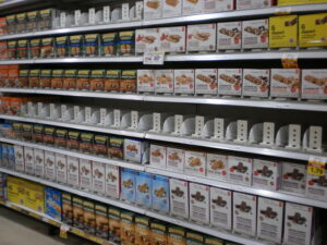 Spring Loaded Shelf Pusher System | Marketing Impact Ltd.