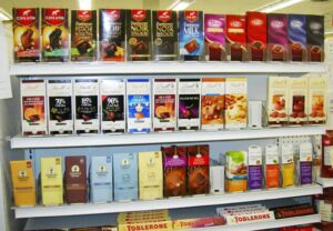 Spring Loaded Shelf Pusher System | Marketing Impact Ltd.